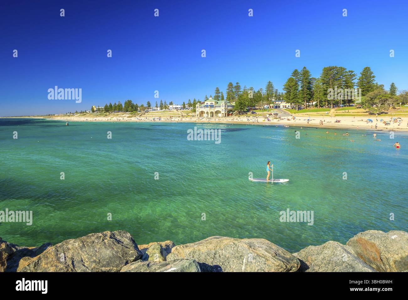 Cottesloe, Western Australia - Jan 2, 2018: woman practices Sup Surf on ...