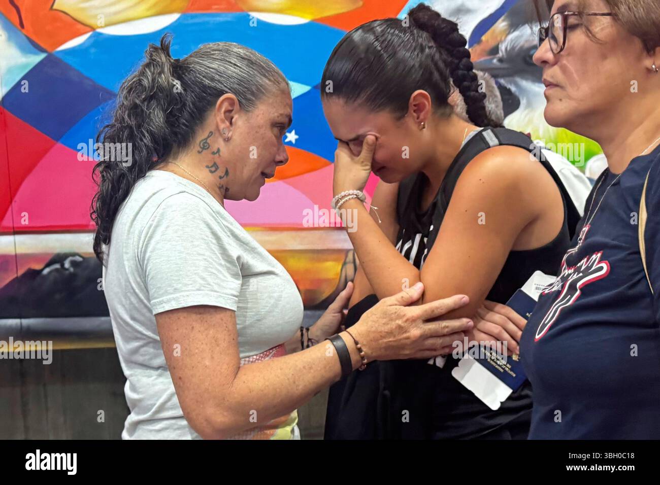 University student Ivanna De Gregorio cries as she says goodbye to her ...