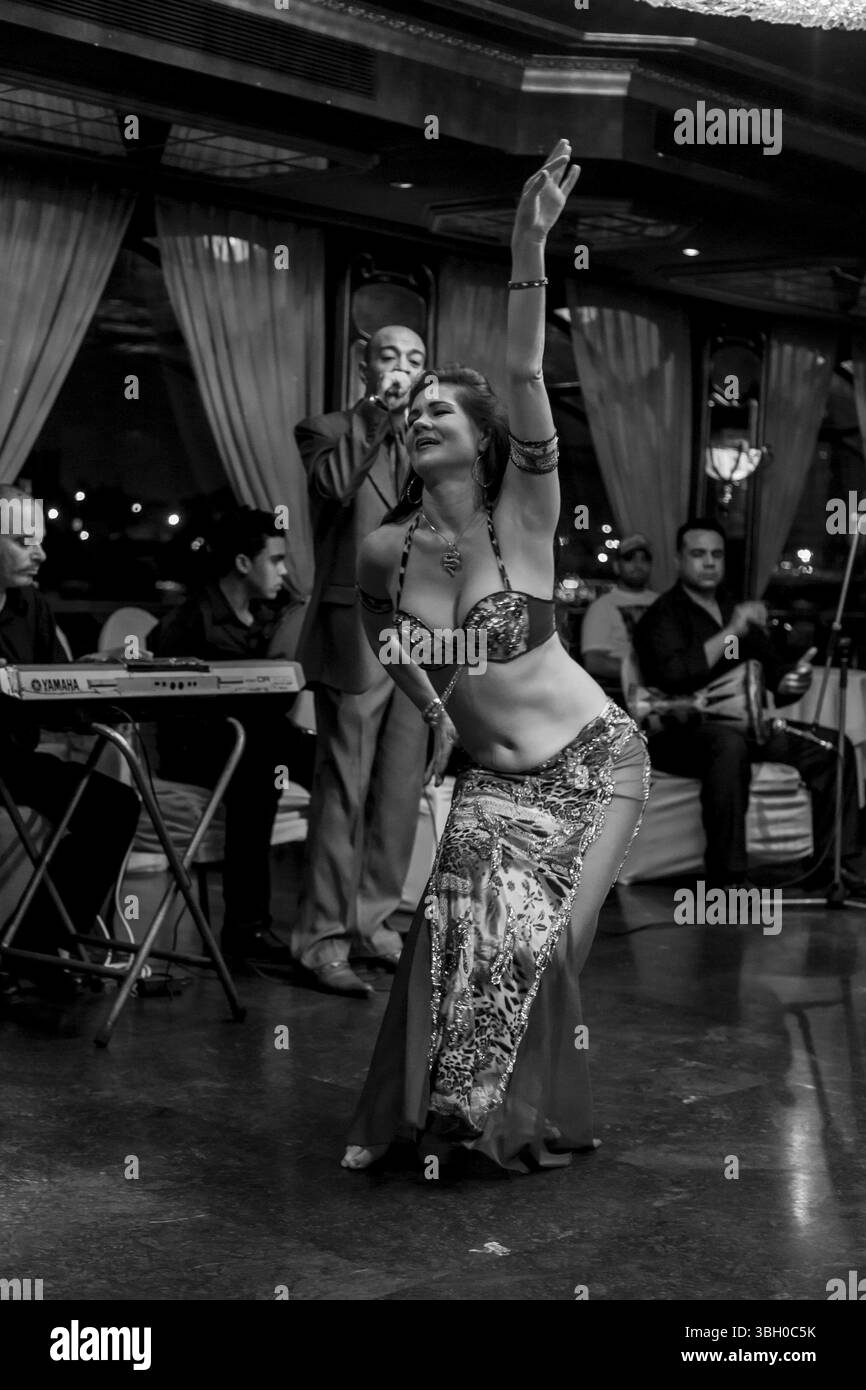 A woman performs the traditional Egyptian Belly Dance on a dinner ...