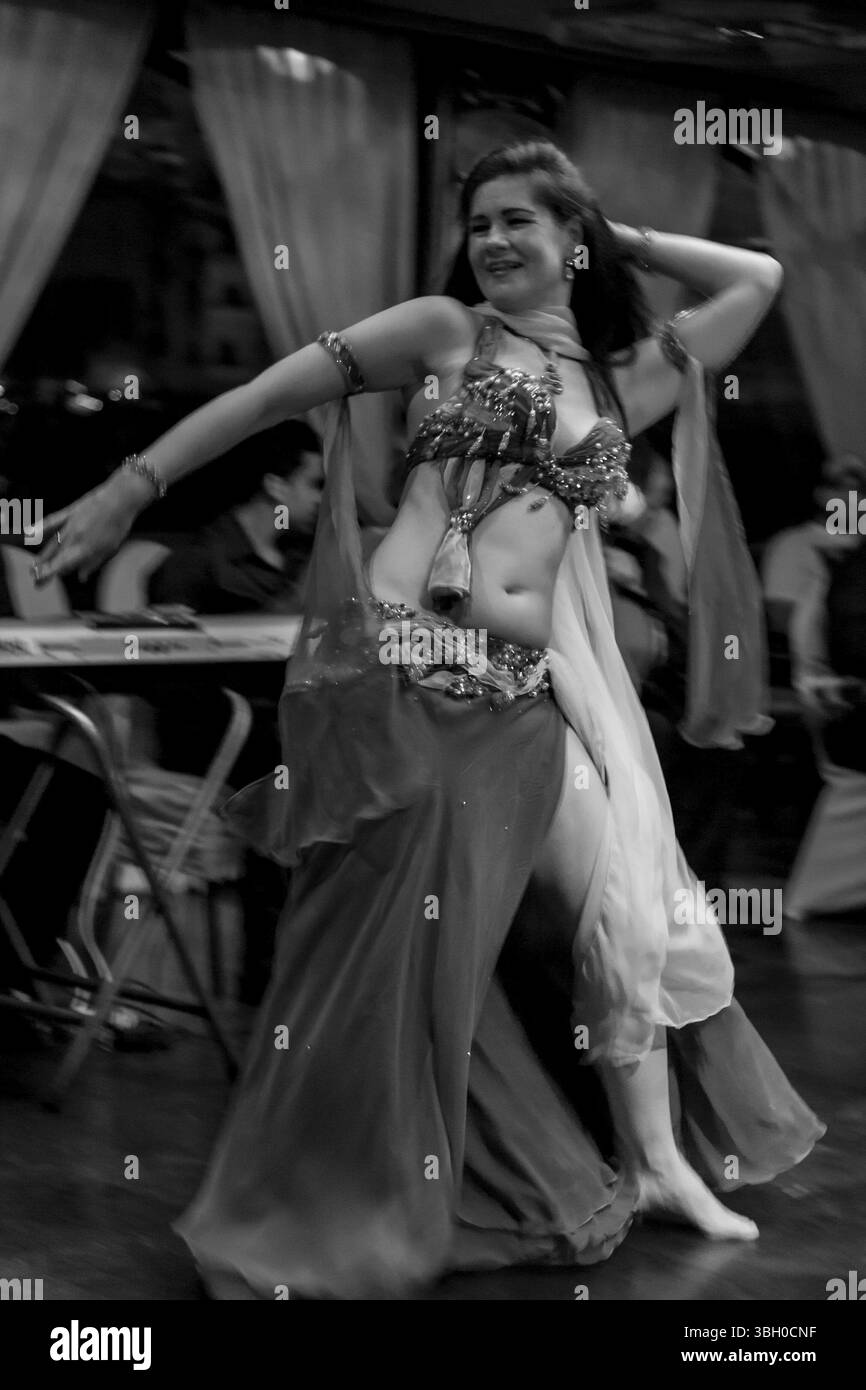 A woman performs the traditional Egyptian Belly Dance on a dinner ...