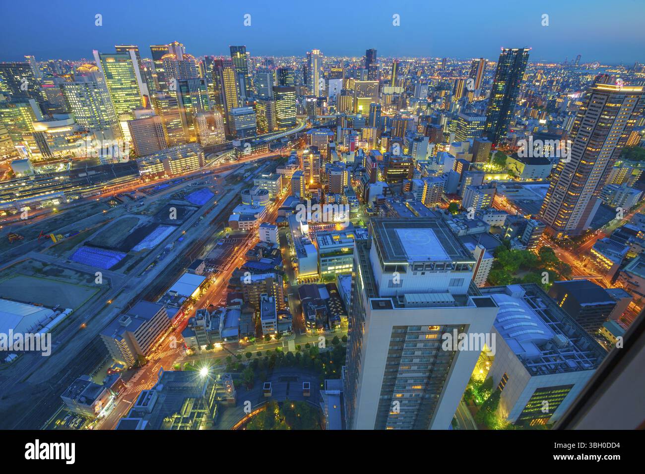 Aerial view of Osaka City Central Business downtown at twilight. Osaka ...