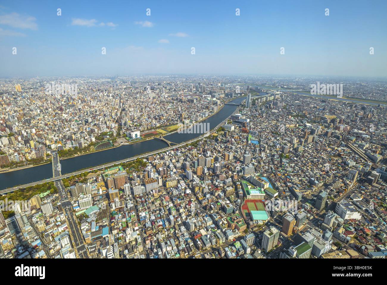 Aerial view of Tokyo city skyline, Sumida River Bridges and Asakusa ...