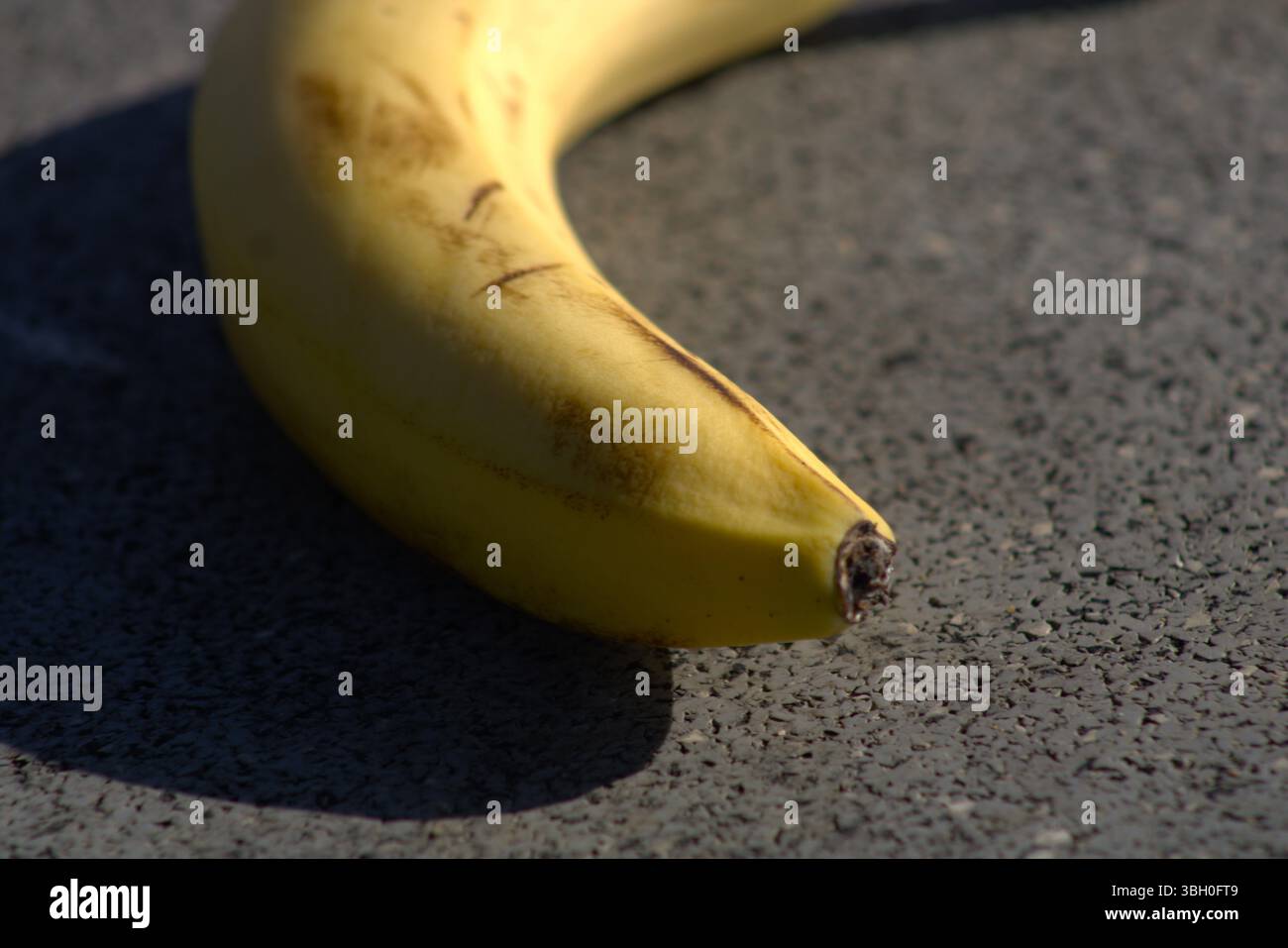 still life of yellow banana on outdoor pedestal Stock Photo - Alamy