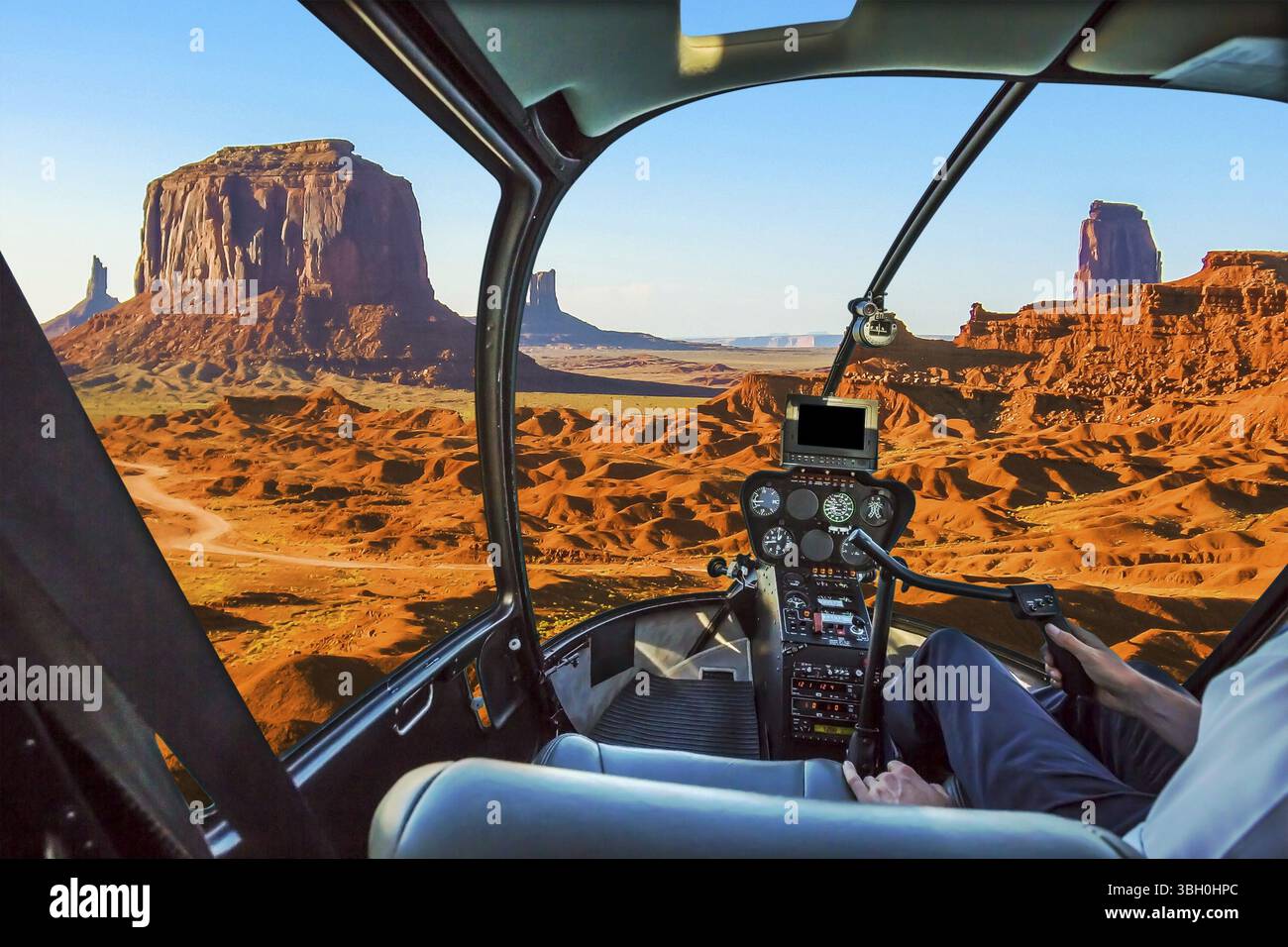 Helicopter cockpit with pilot arm and control console inside the cabin ...