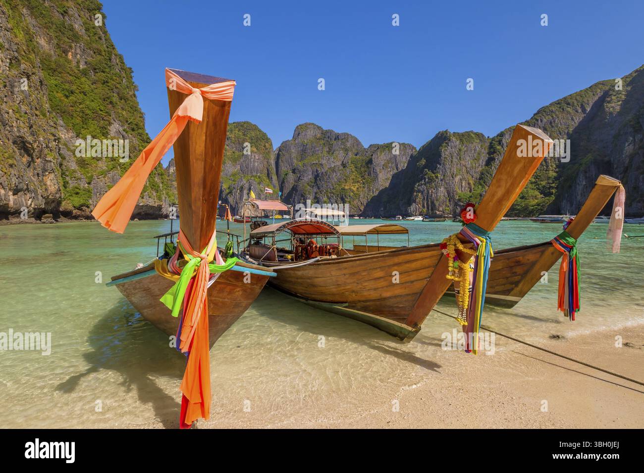 Long Tail Boat, traditional wooden boats, at Maya Bay lagoon of famous ...