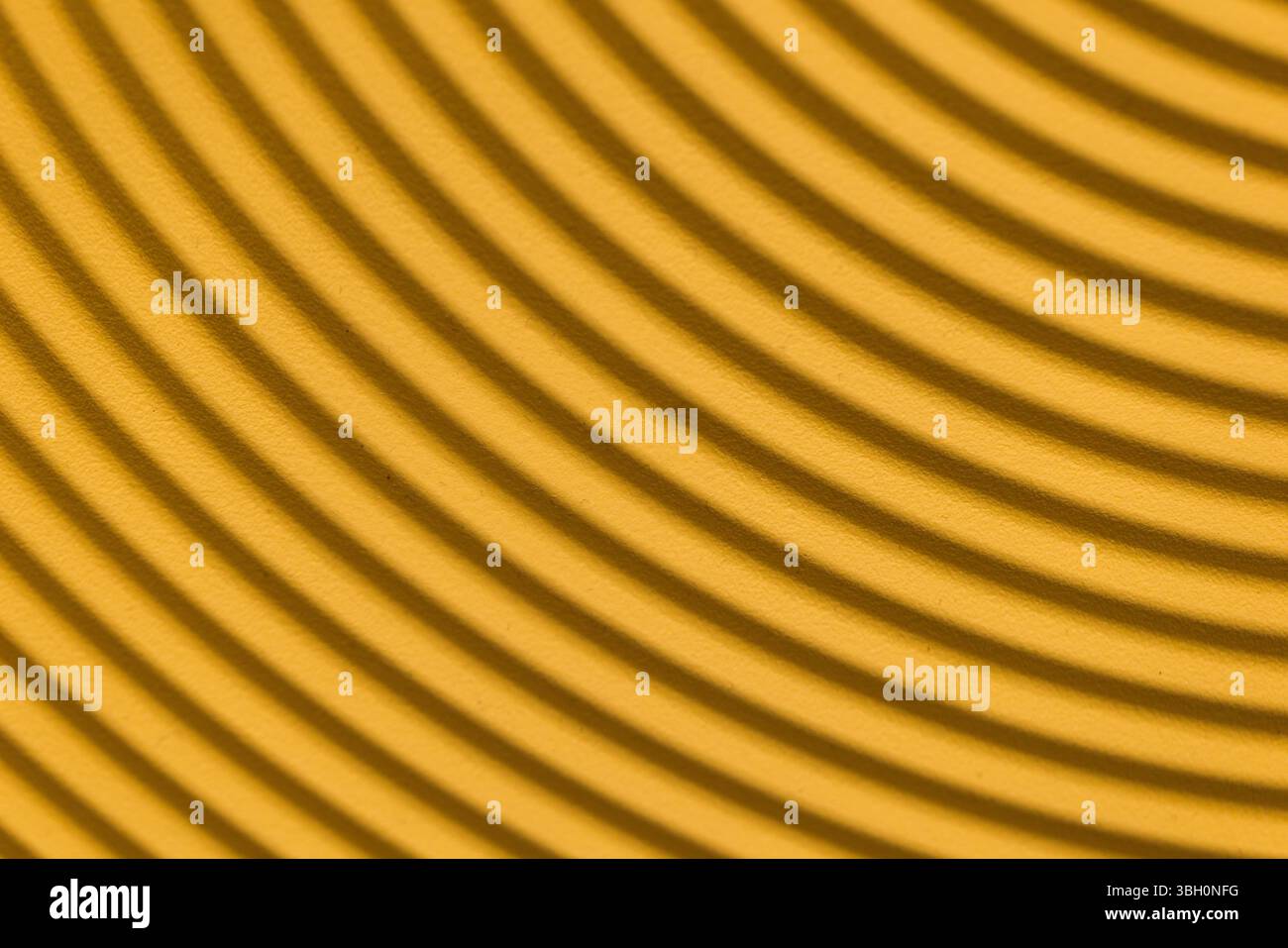 Abstract Yellow Background with Curved Parallel Lines and Shadows Stock ...
