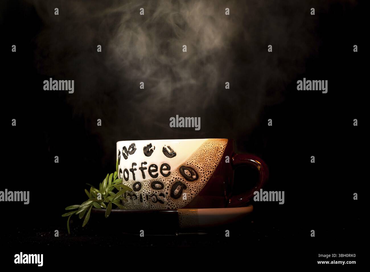 A low key image of a hot cup of coffee with steam blowing up Stock ...