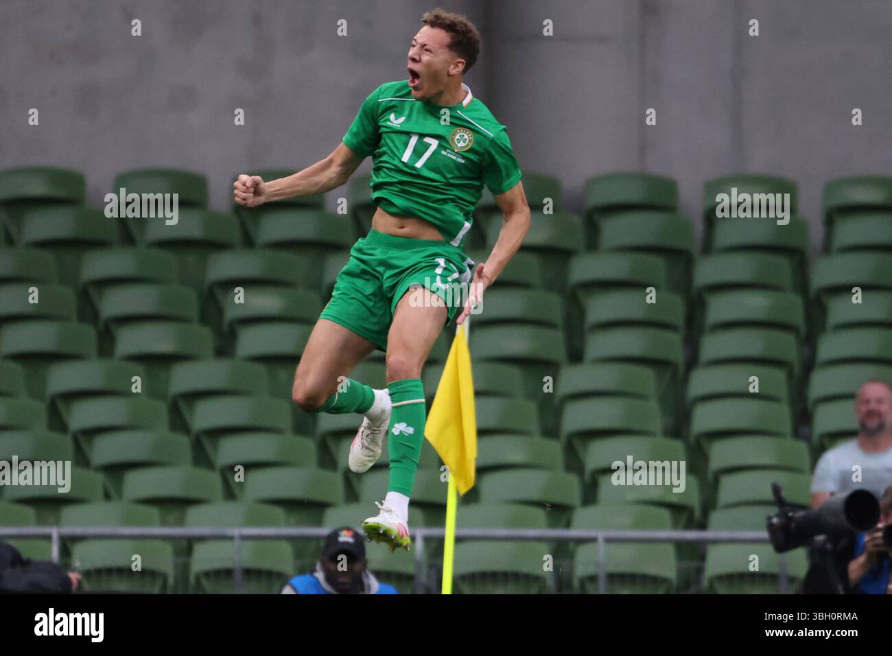 Ireland's Kasey McAteer celebrates after scoring during a friendly ...