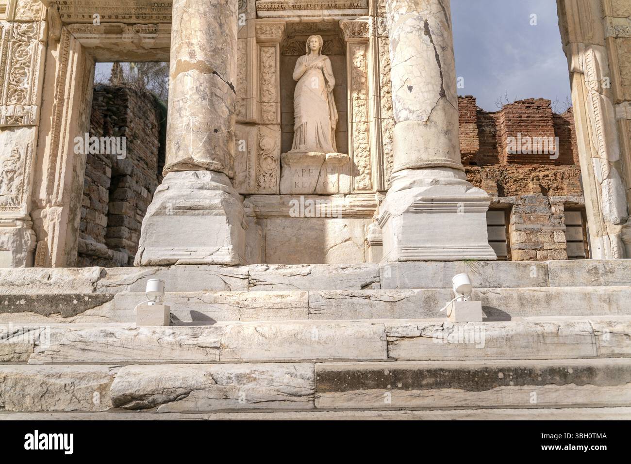 Celsus Library in Ephesus in Selcuk (Izmir), Turkey. Marble statue is ...