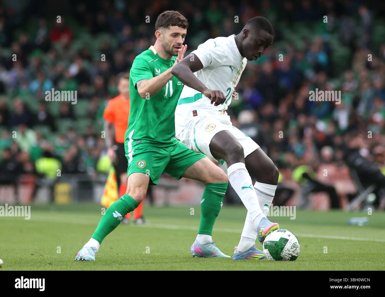 Republic of Ireland's Robbie Brady (left) and Senegal's Antoine Mendy ...