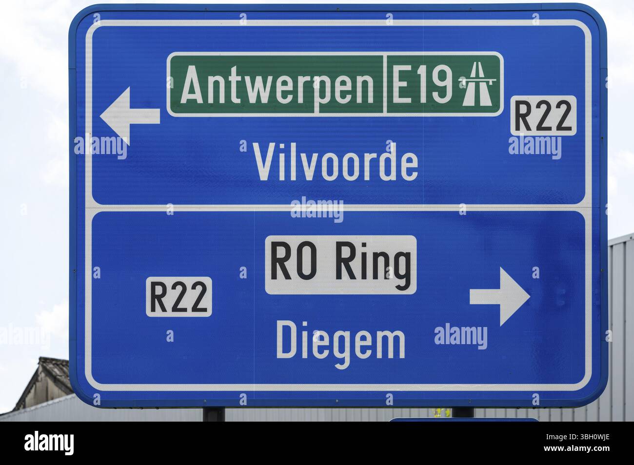 Machelen, Flanders, Belgium, June 8, 2024 - Road direction signs to the E19 highway and the R0 ...