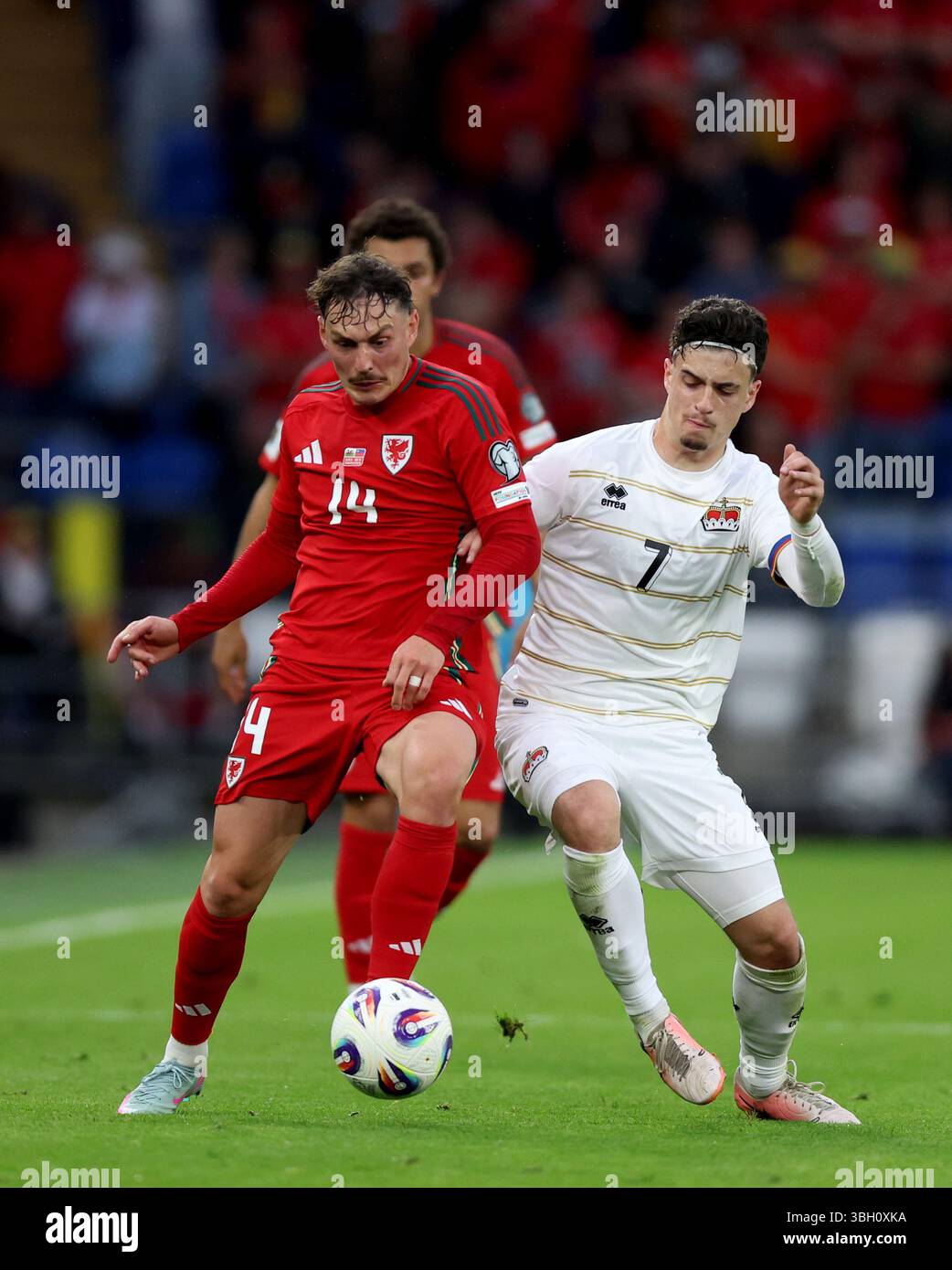 Wales' Connor Roberts (left) and Liechtenstein's Fabio Luque Notaro ...