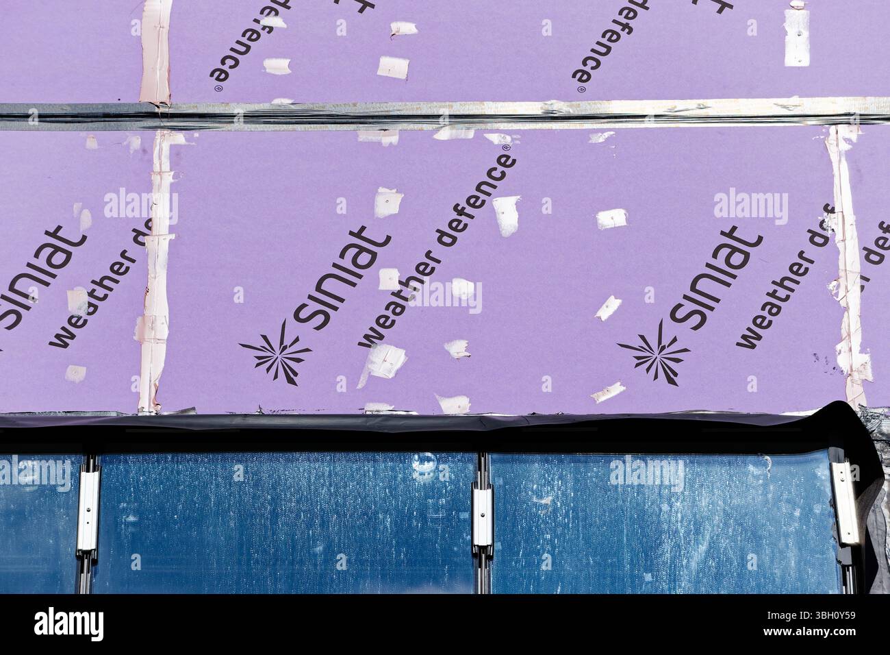 Steel skeleton frame with weather defence backing boards installed at ...