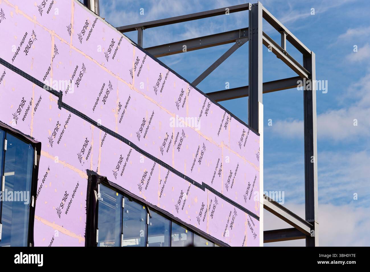 Steel skeleton frame with weather defence backing boards installed at ...