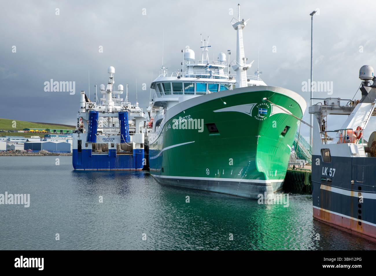 Fishing boats moored around Lerwick Fish Market at Mair's Quay ...