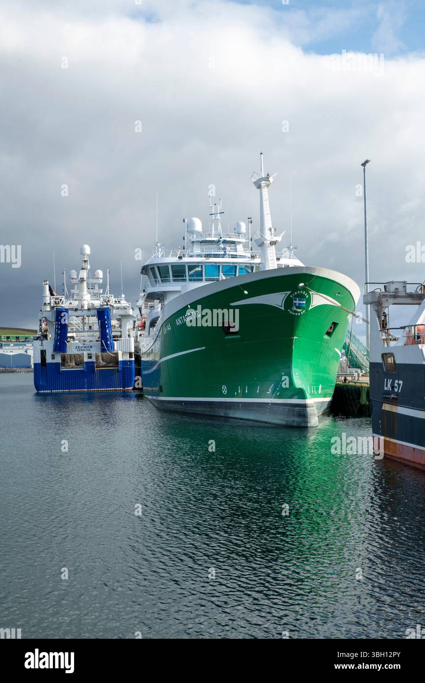 Fishing boats moored around Lerwick Fish Market at Mair's Quay ...