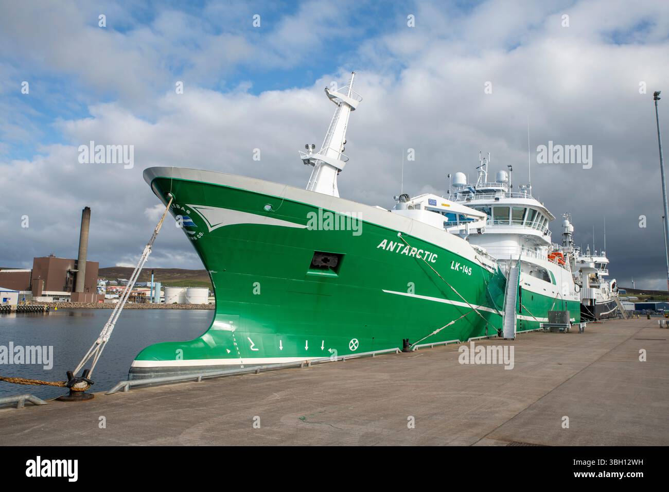 Fishing boats moored around Lerwick Fish Market at Mair's Quay ...