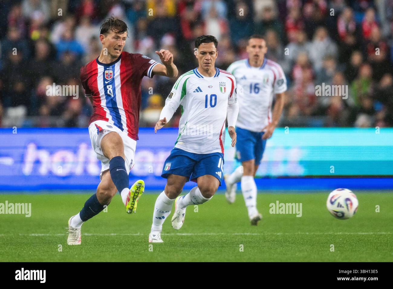 Sander Berge of, Norway. , . and Giacomo Raspadori of Italy during the ...