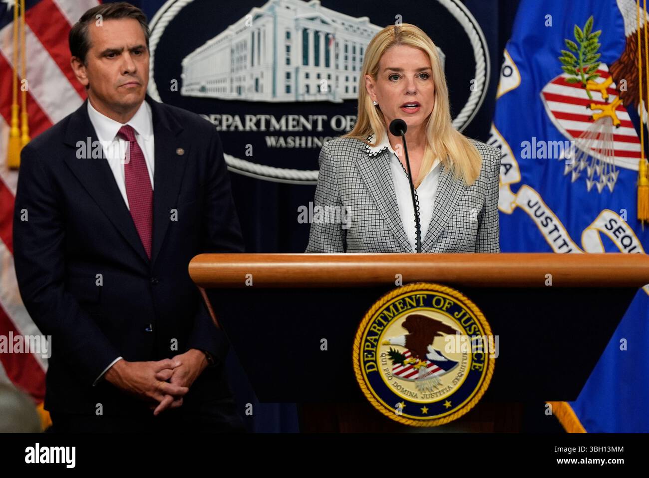 Attorney General Pam Bondi speaks as Deputy Attorney General Todd ...