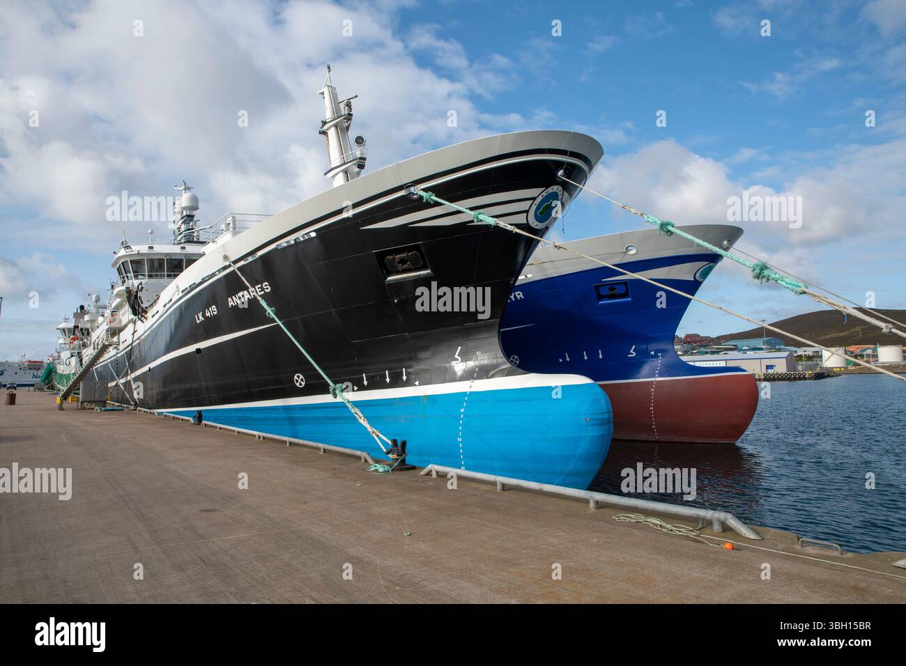 Fishing boats moored around Lerwick Fish Market at Mair's Quay ...