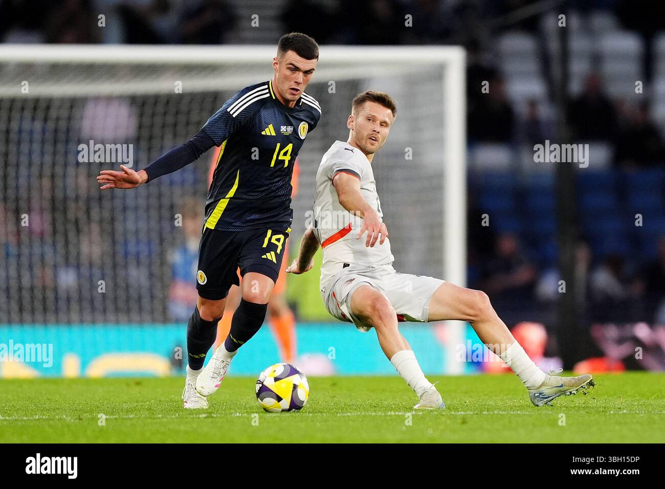 Scotland's Lennon Miller (left) and Iceland's Arnor Ingvi Traustason ...
