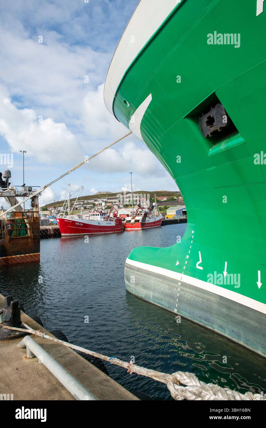 Fishing boats moored around Lerwick Fish Market at Mair's Quay ...