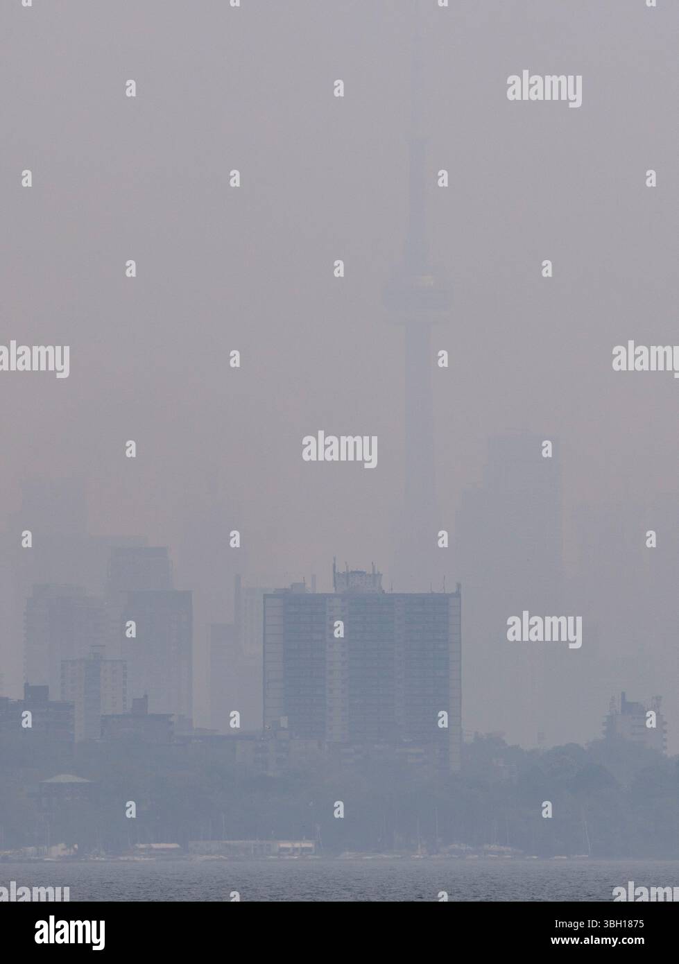 Toronto, Canada. 6th June, 2025. Buildings are shrouded in smoke from ...