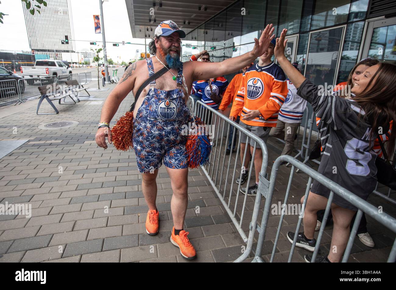 Edmonton Oilers fans line up outside the arena before Game 2 of the NHL ...