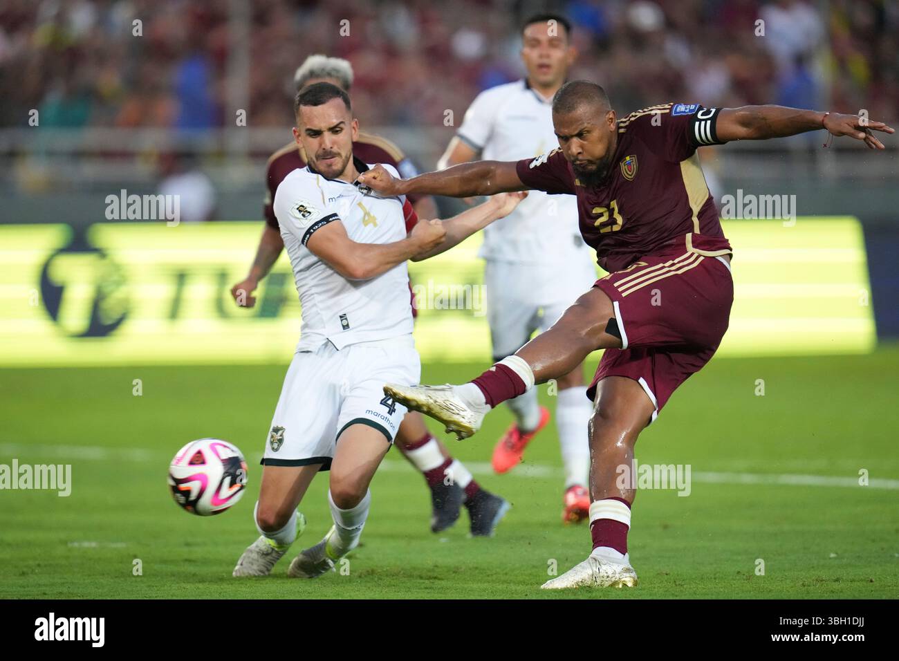 Venezuela's Salomon Rondon, right, scores his side's second goal ...
