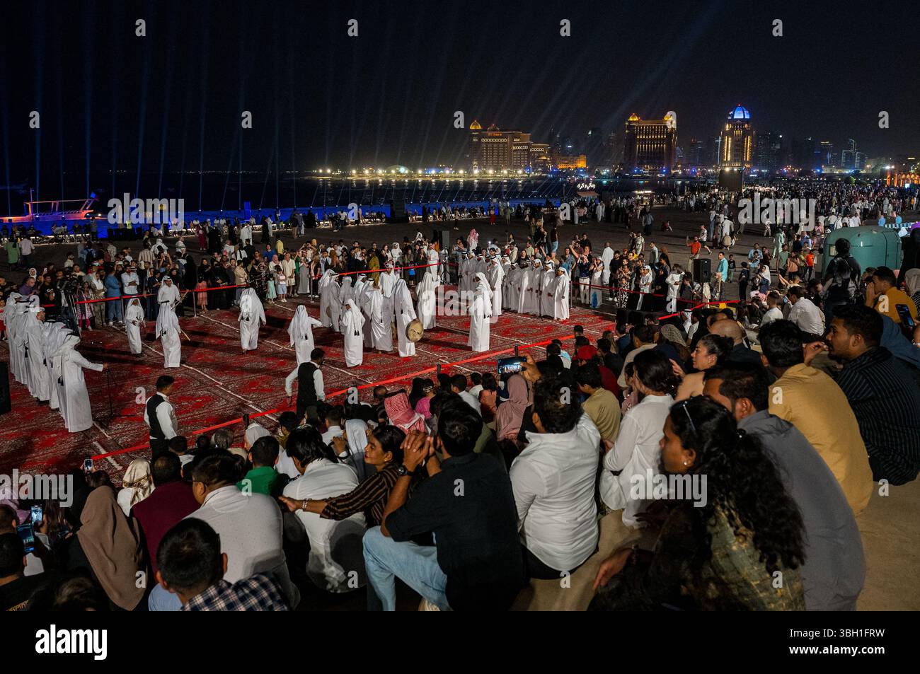 Qatari artists perform a traditional folklore dance (Ardah dance) at ...
