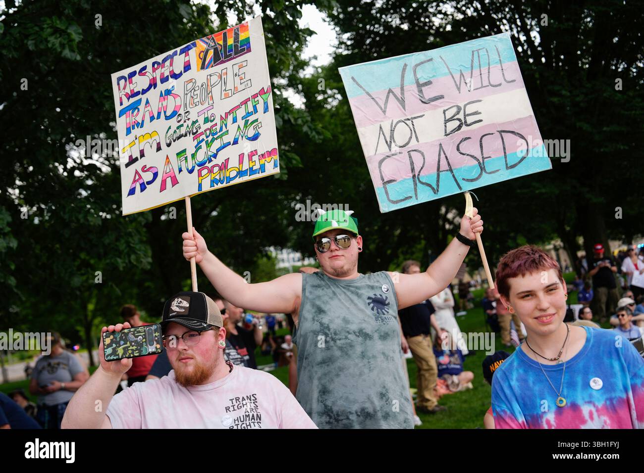 Veterans and others demonstrate at a Unite for Veterans rally, Friday ...