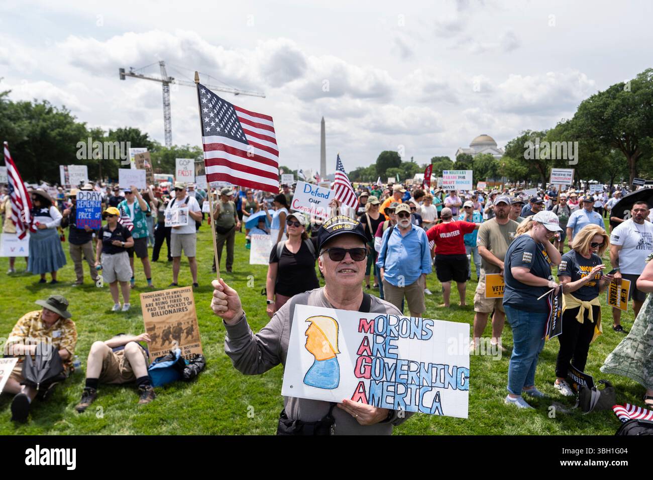 Veterans and others demonstrate at a Unite for Veterans rally, Friday ...