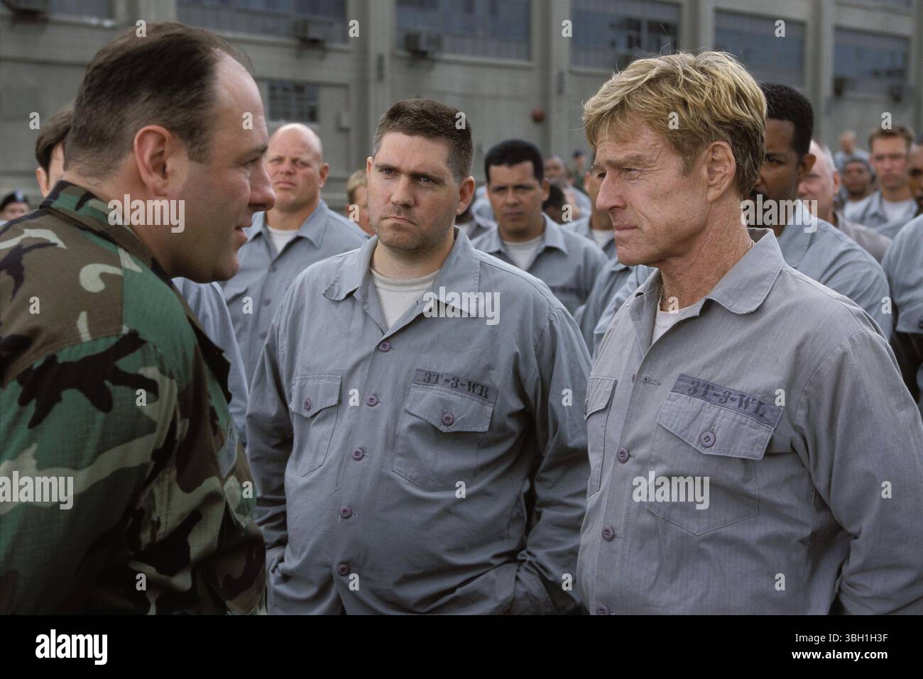 Colonel Winter (JAMES GANDOLFINI, far left) confronts the leader of the ...