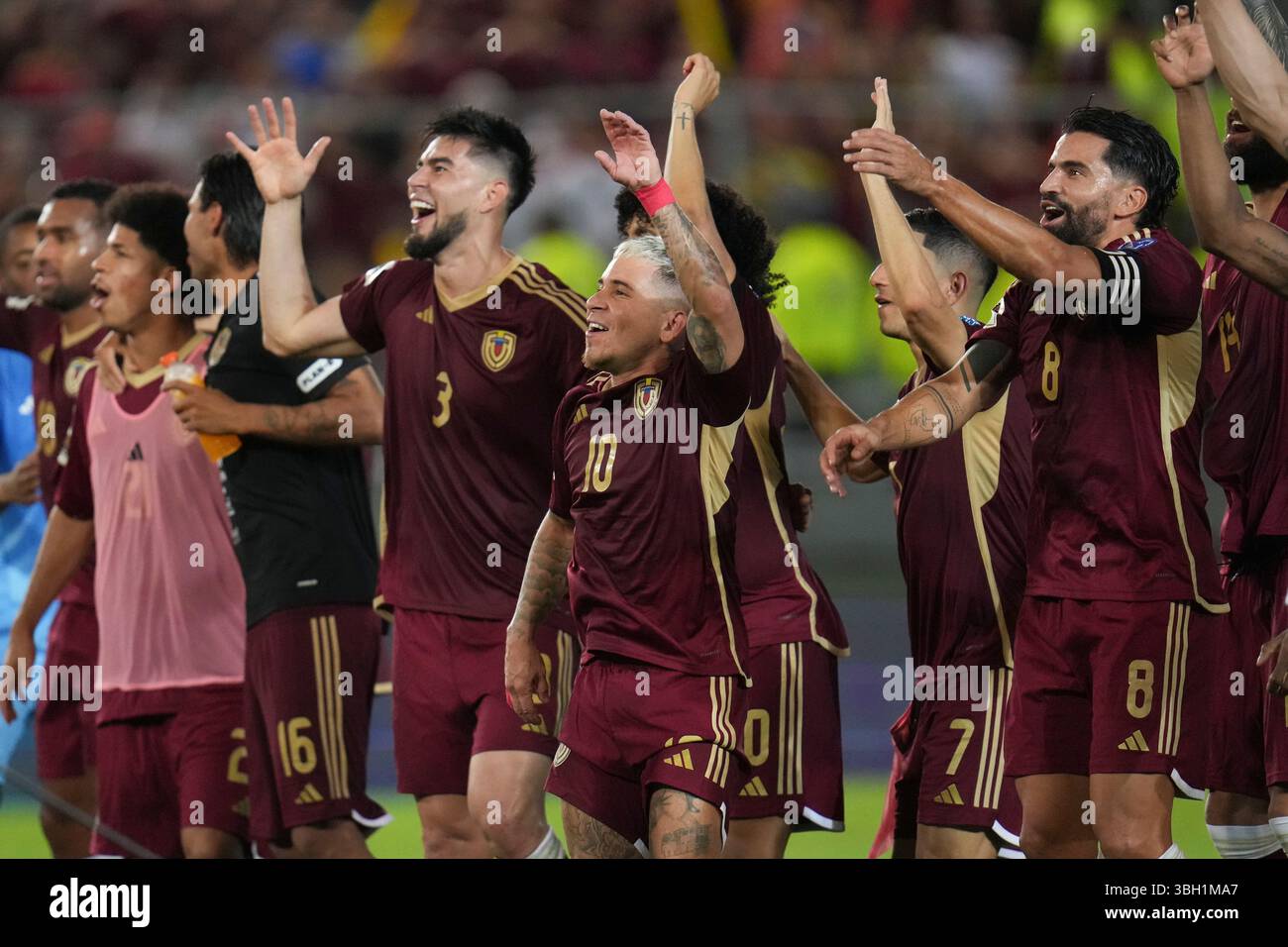 Venezuela's players celebrate at the end of a World Cup 2026 qualifying ...