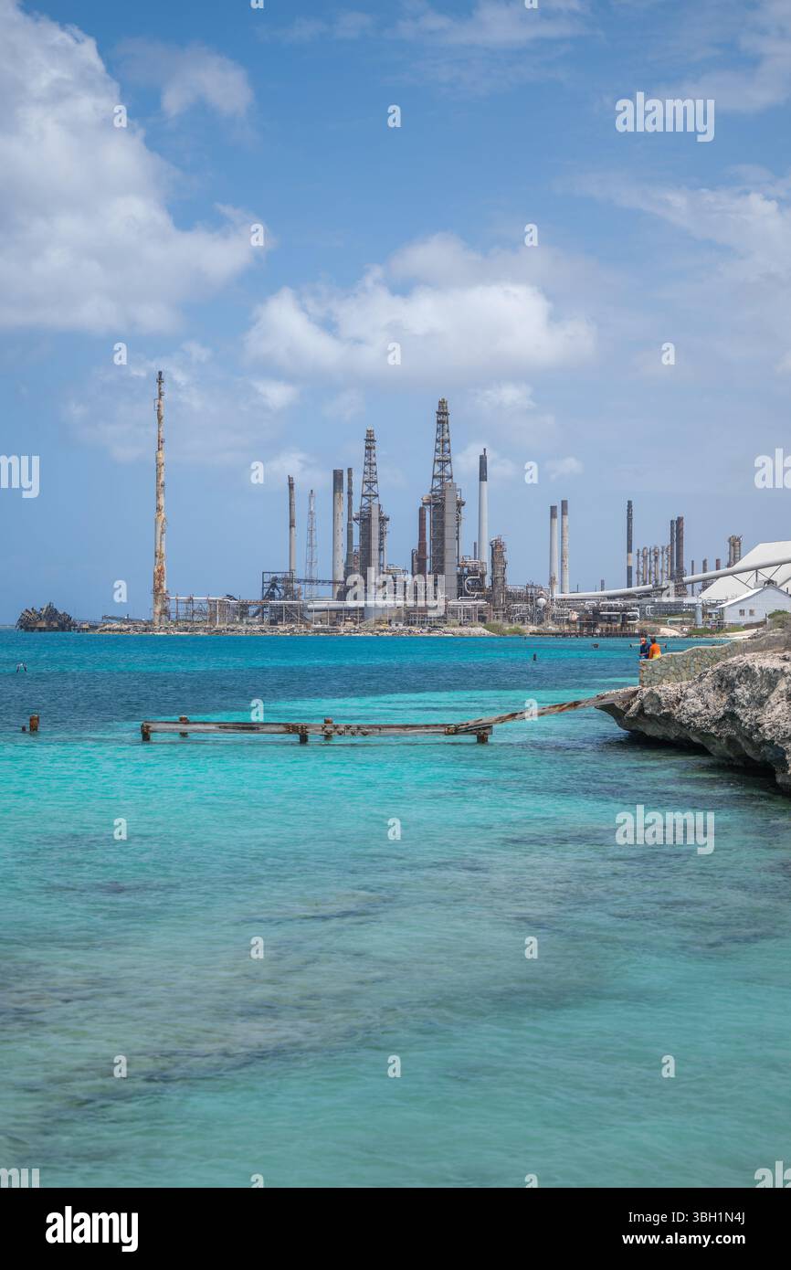 View of Aruba Refinery and Rogers beach coast with fishermen Stock ...