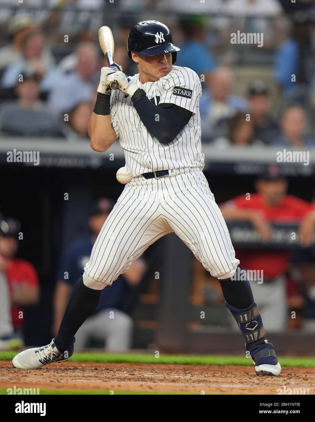 New York Yankees' Anthony Volpe is hit by a pitch for an RBI during the second inning of a ...