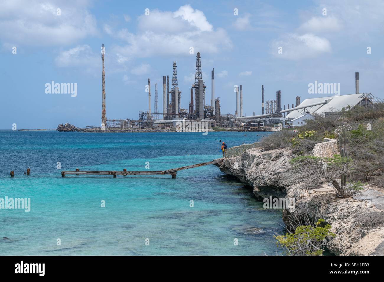 View of Aruba Refinery and Rogers beach coast with fishermen Stock ...
