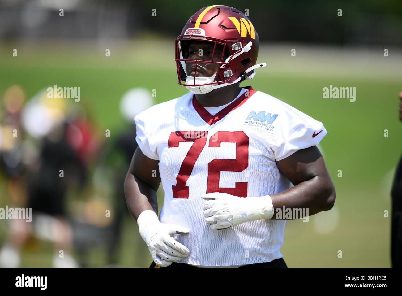 Washington Commanders offensive tackle Josh Conerly Jr. (72) works out ...