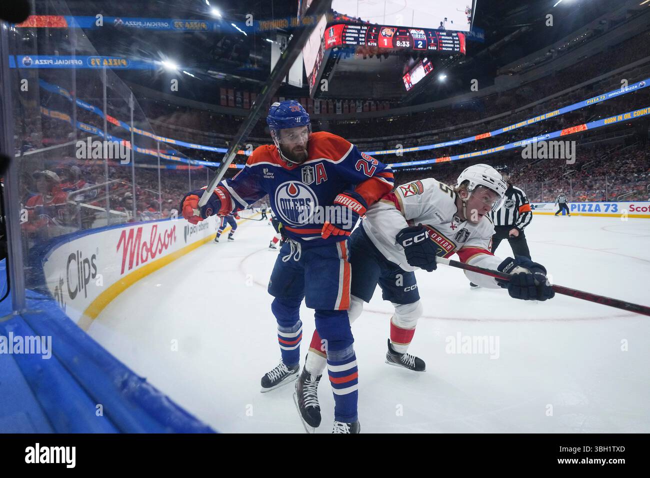 Edmonton Oilers' Leon Draisaitl, left, and Florida Panthers' Anton ...