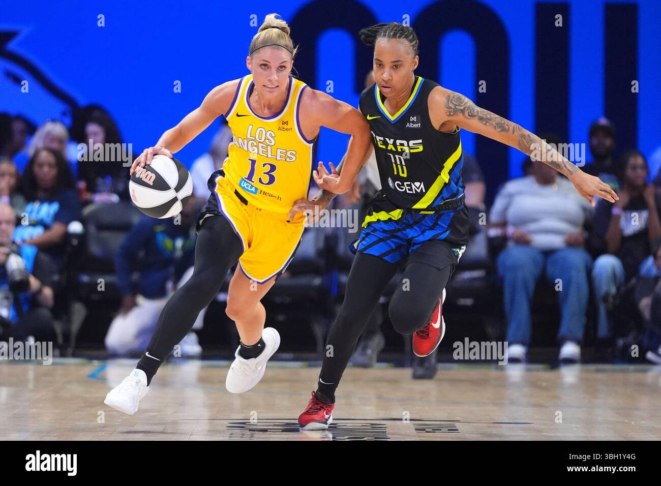 Los Angeles Sparks guard Sarah Ashlee Barker (13) drives against Dallas ...