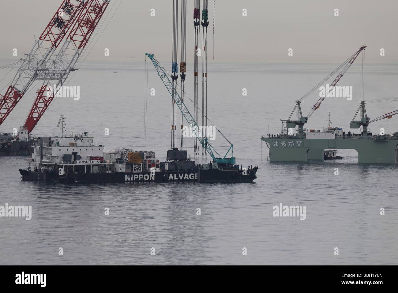 A photo shows a salvage ship starting salvage work for the minesweeper ...