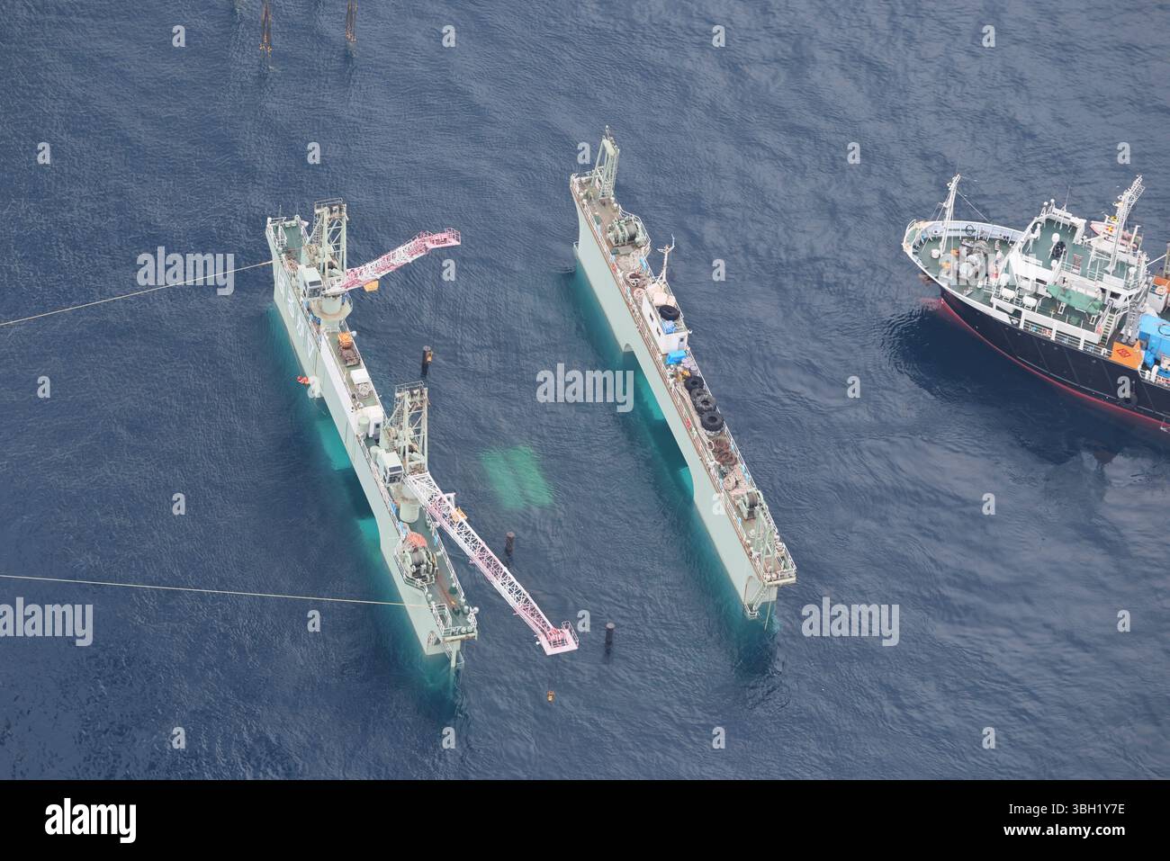 An aerial photo shows a salvage ship starting salvage work for the ...
