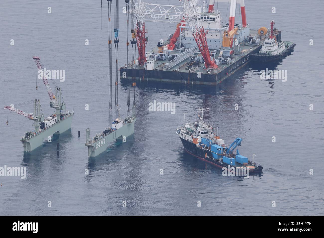An aerial photo shows a salvage ship starting salvage work for the ...