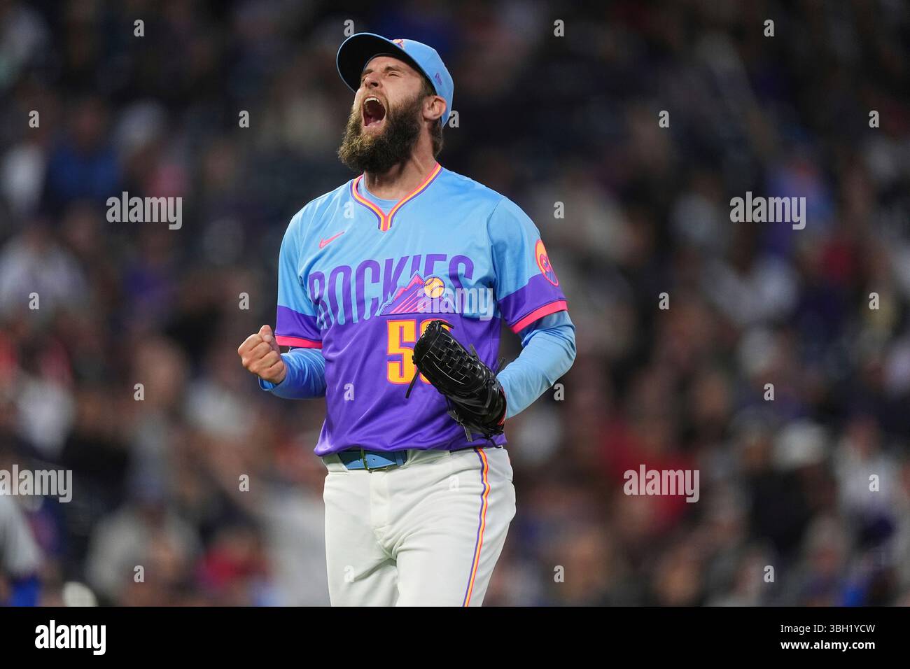 Colorado Rockies relief pitcher Jake Bird reacts after striking out New ...