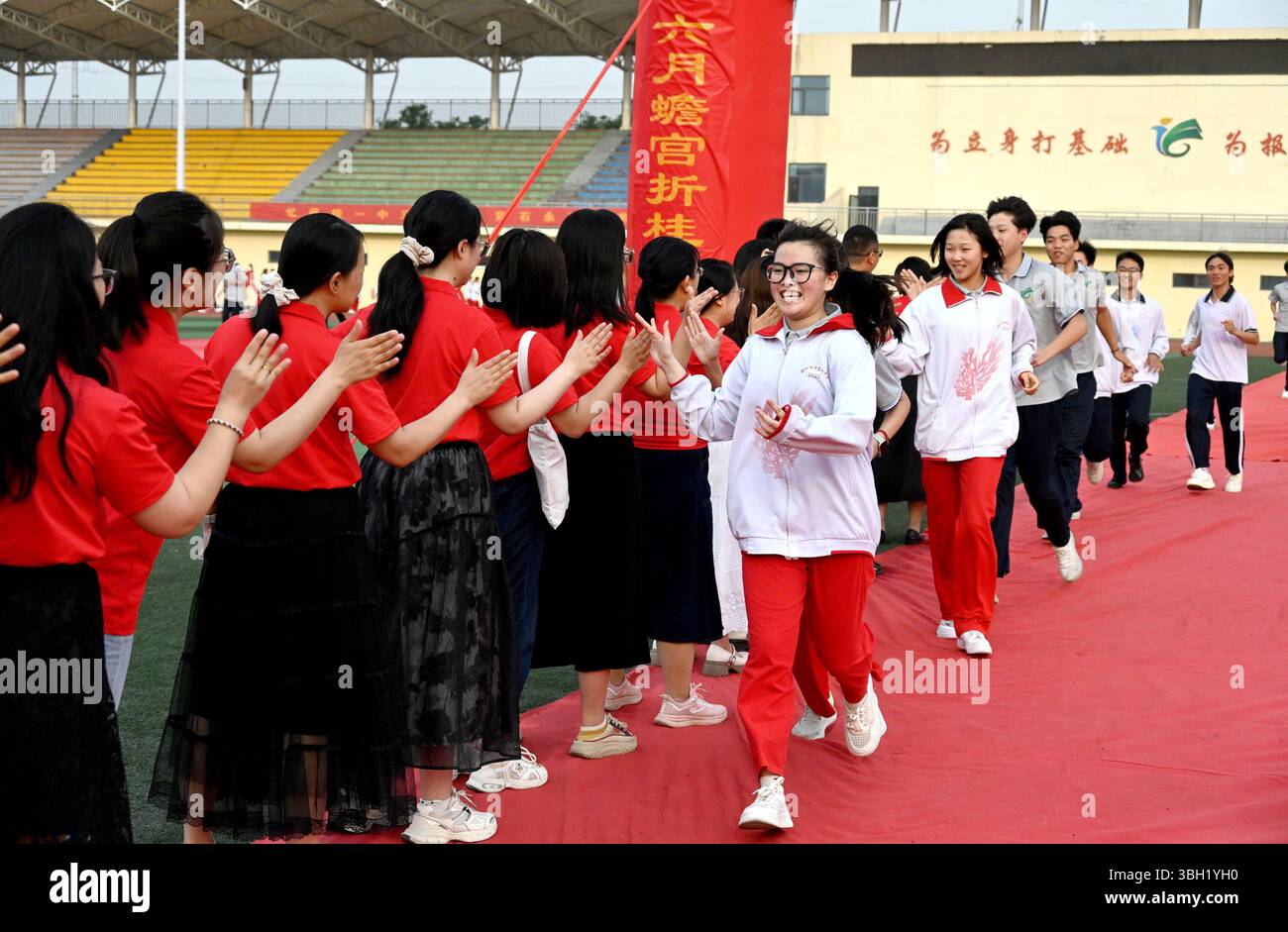 HANDAN, CHINA - JUNE 7, 2025 - Teachers and students taking the college ...