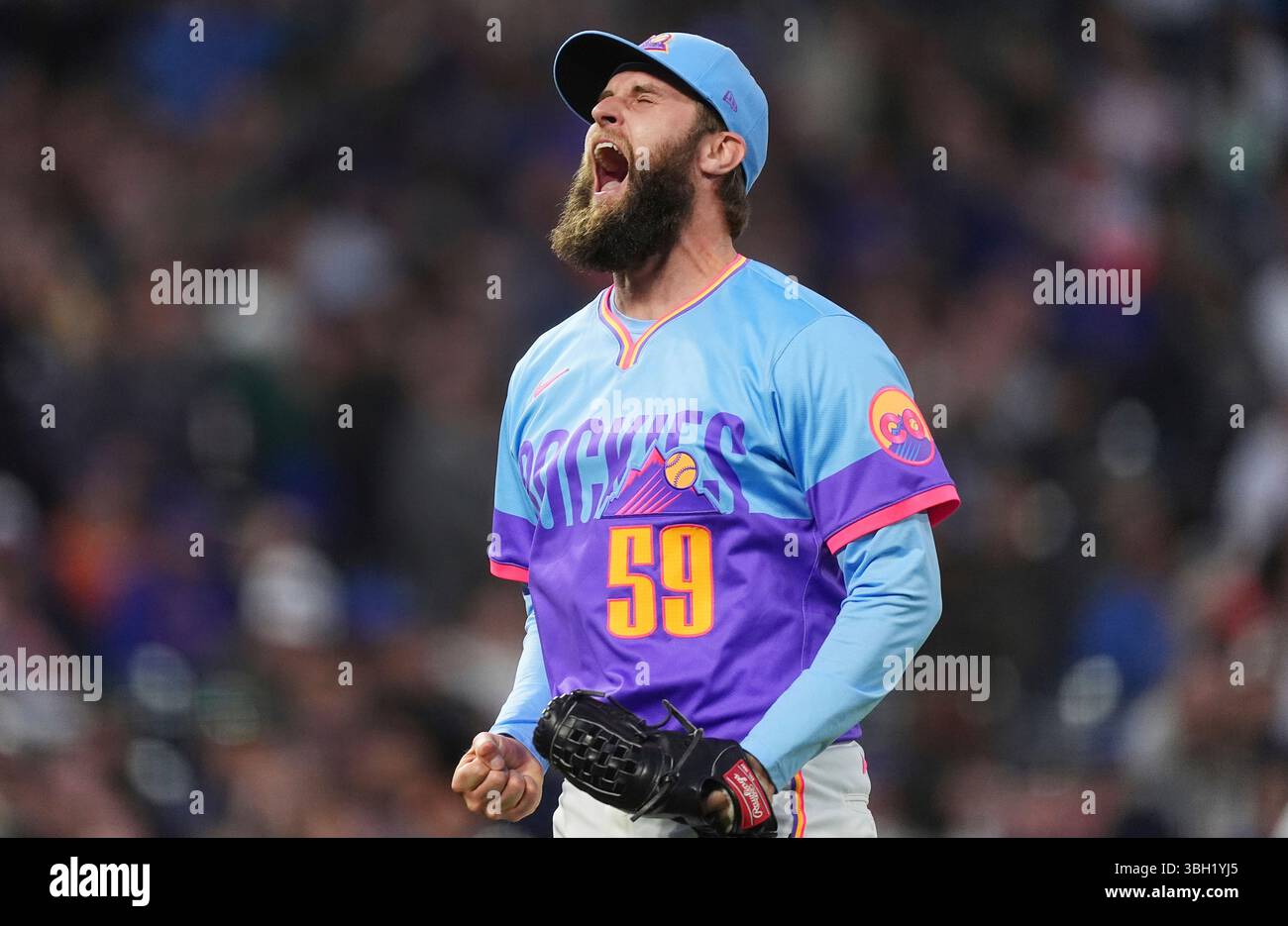 Colorado Rockies relief pitcher Jake Bird reacts after striking out New ...