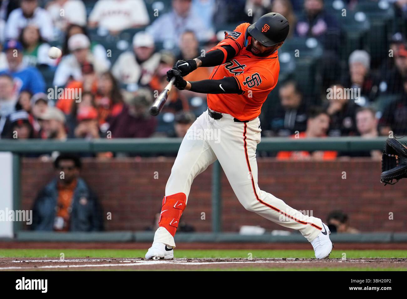 San Francisco Giants' Dominic Smith hits a sacrifice fly during the ...