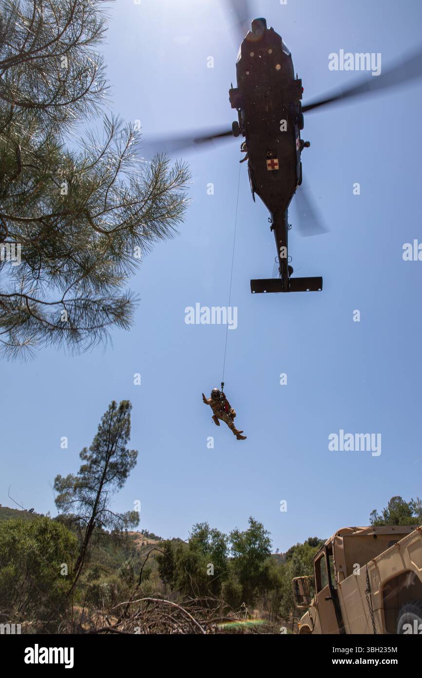U.S. Army Reserve Staff Sgt. Andrew Strohman, a combat medic specialist assigned to Charlie ...
