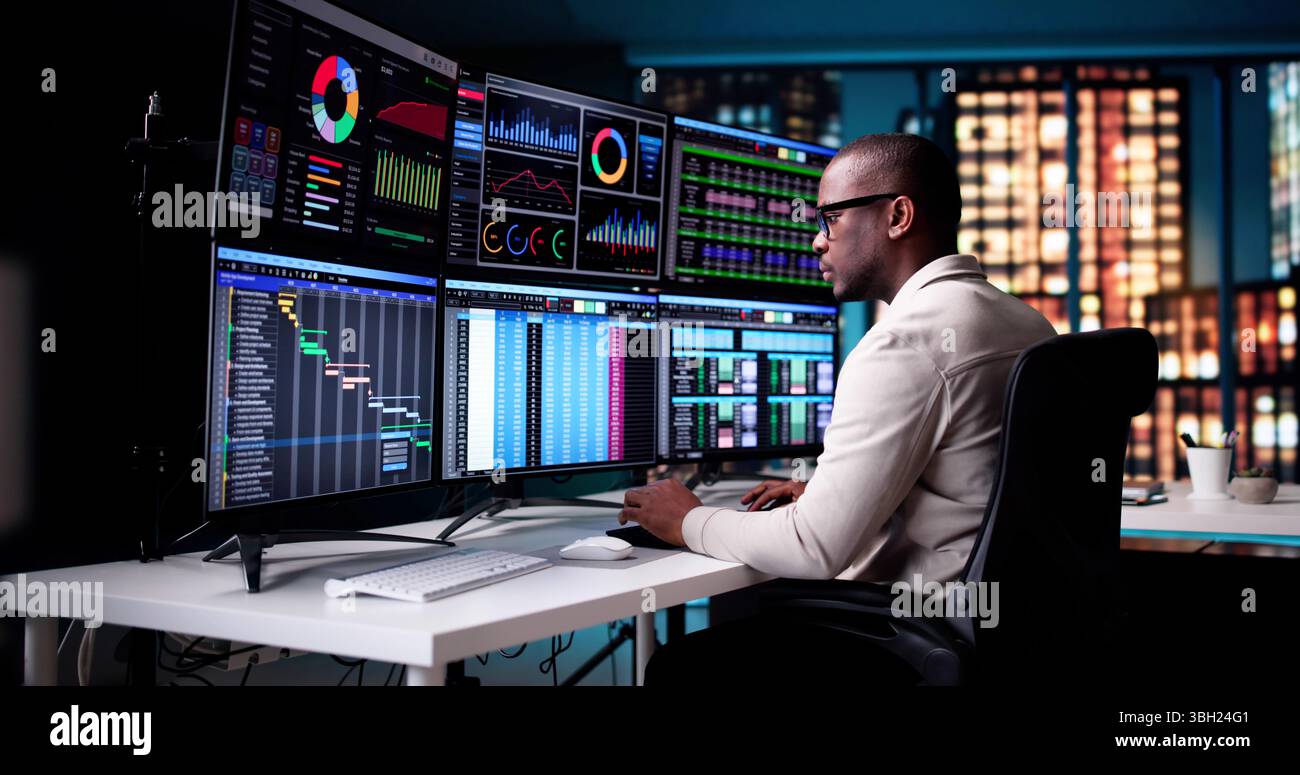 Analyst studying pc screen hi-res stock photography and images - Alamy