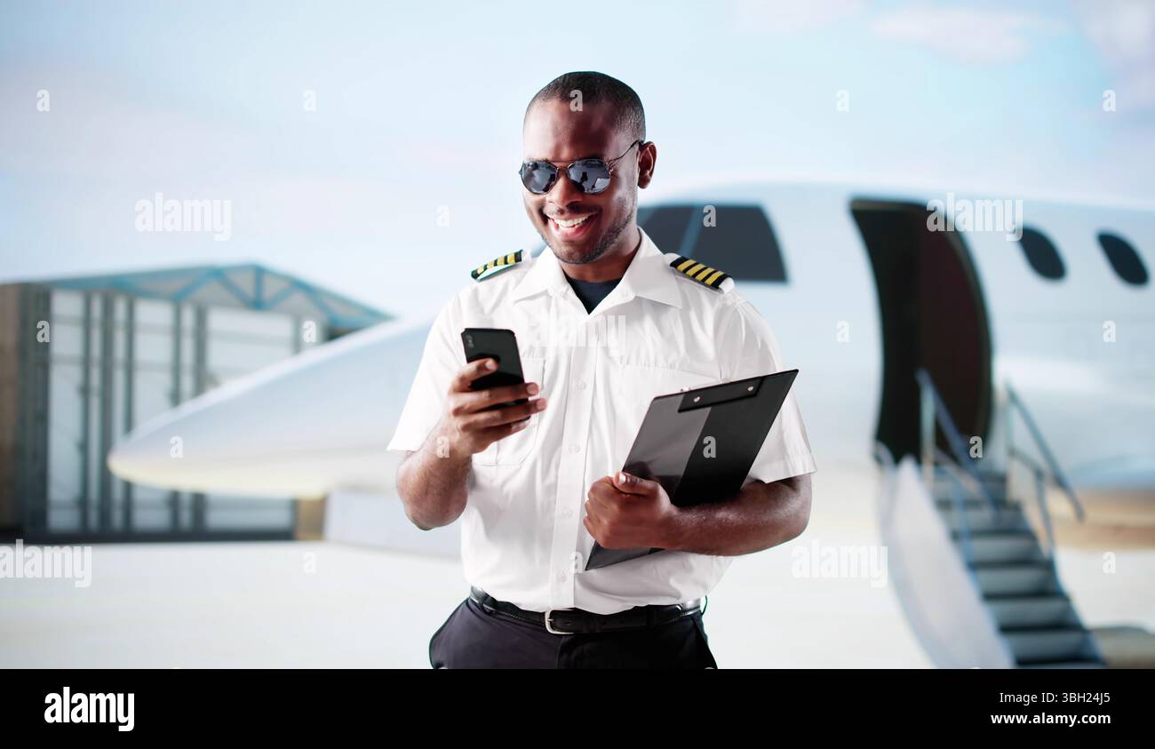 Professional African American Pilot In Uniform Smiling At Airport ...